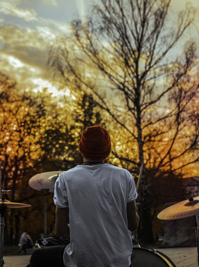 Free: Back View Photo of Man Playing Drums During Golden Hour - nohat.cc