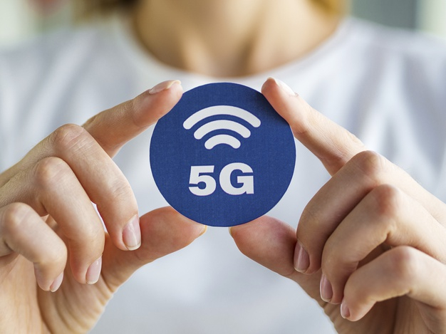 Free: Close-up person holding 5g sticker Free Photo - nohat.cc