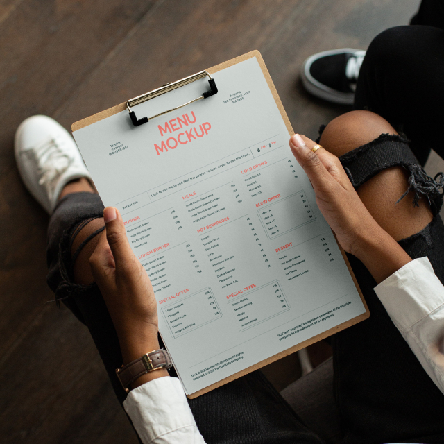 Free: Free Menu in Hands Mockup - nohat.cc