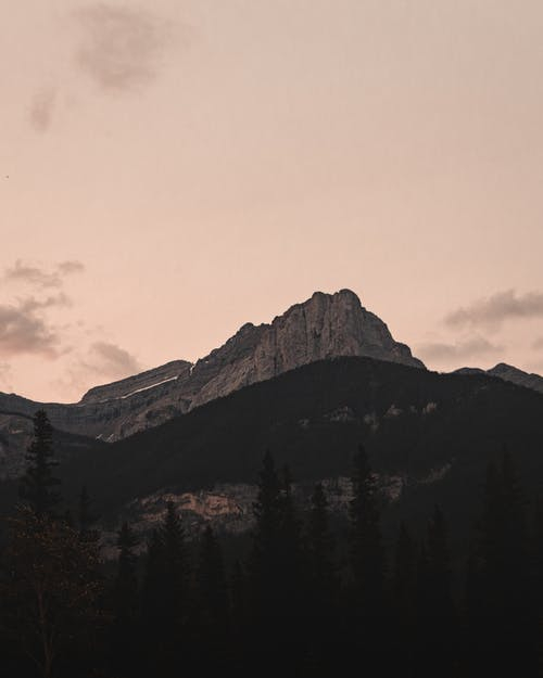 Free: Green Trees Near Mountain Under Cloudy Sky · Free Stock Photo ...