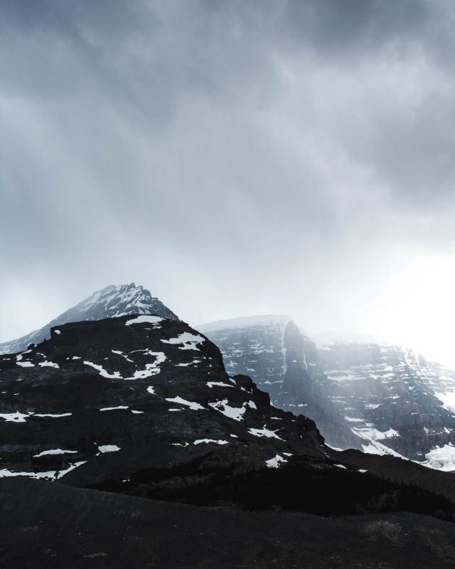 Free: Light rays penetrate the clouds above Jasper's sub-zero ...