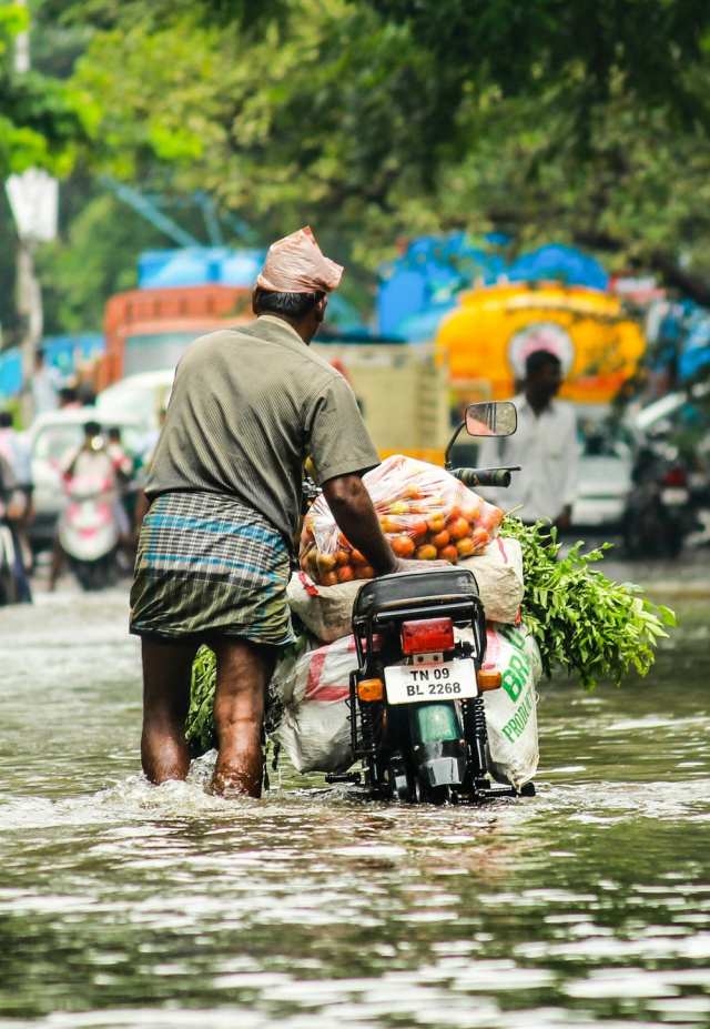 Free: Man Pushing Motorcycle - nohat.cc