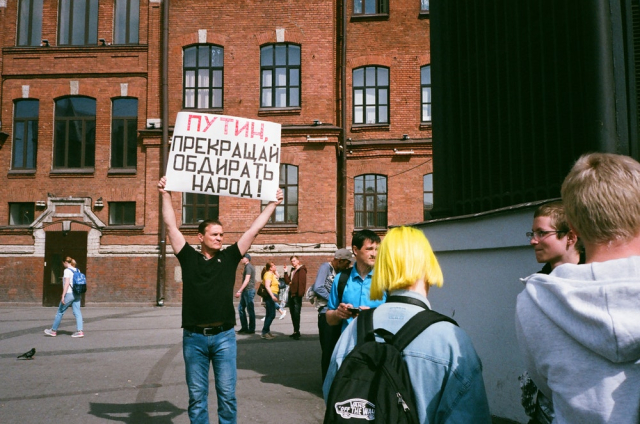 Free: Man Standing Outdoor While Holding Signage - nohat.cc