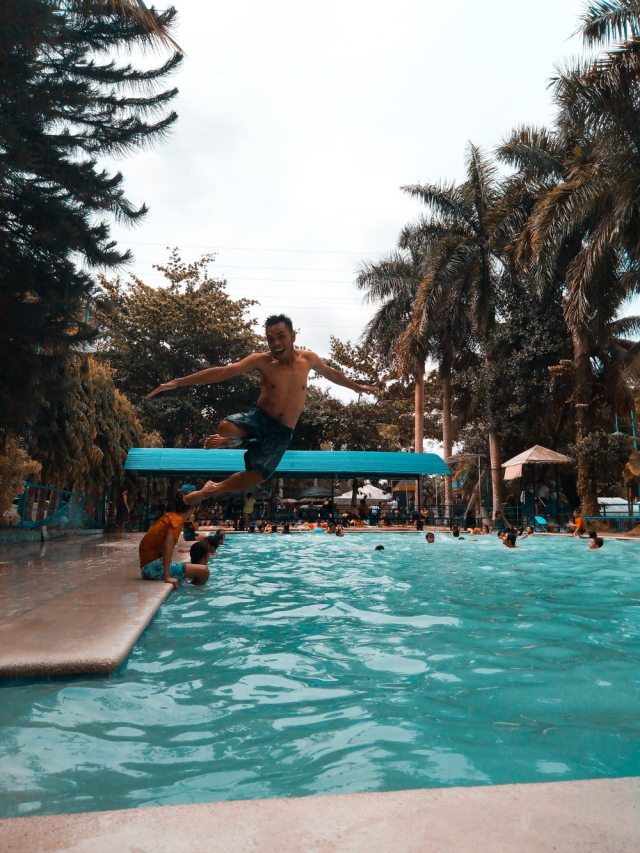 Free: Photo of a man jumping into a swimming pool - nohat.cc