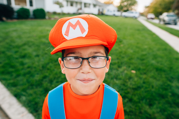Free: Photo of Boy in Super Mario Costume Smiling - nohat.cc