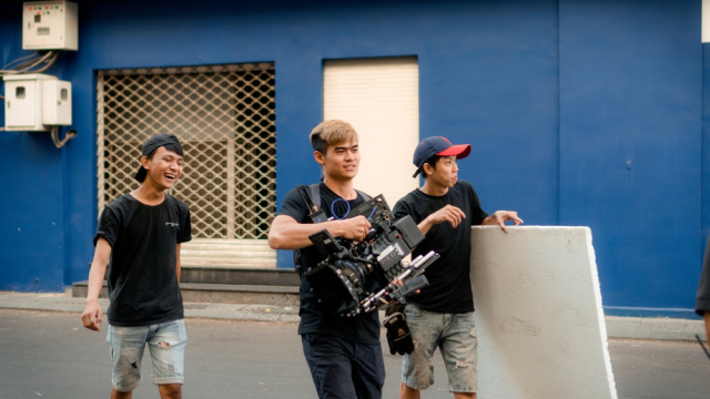 Free: Photo Of Camera Crew Walking On Road - nohat.cc