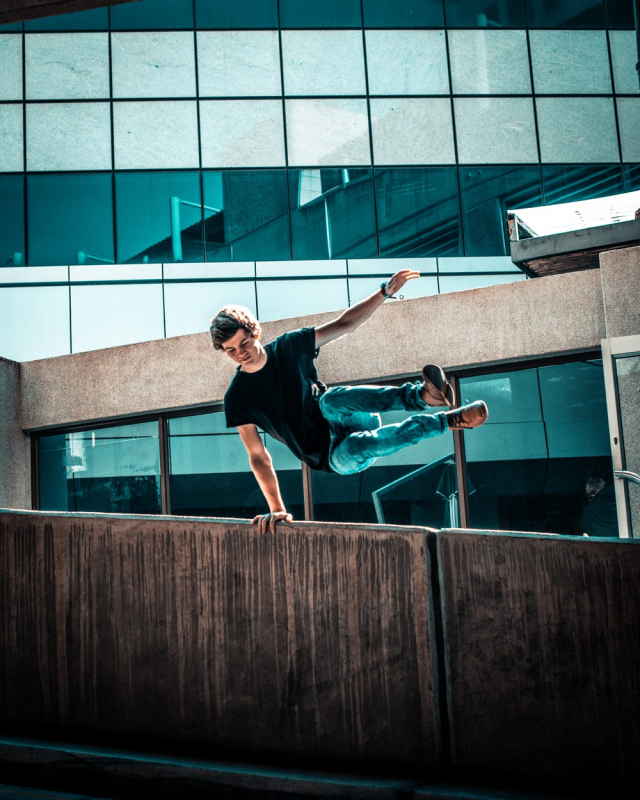 Free: Photo Of Man Jumping Over The Wall - nohat.cc