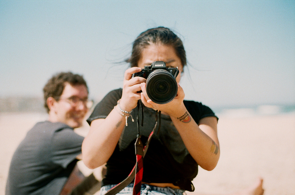 Free: Photo of Woman Aiming Camera - nohat.cc