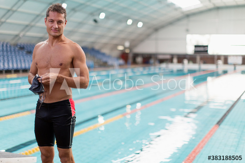Free: Portrait confident male swimmer at indoor swimming pool - nohat.cc