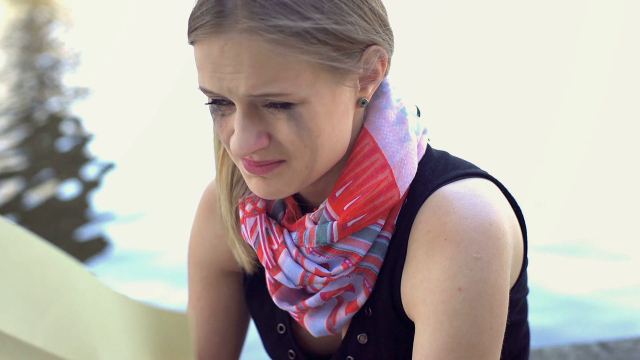 Free: Sad girl crying while reading love letter by the river Stock ...