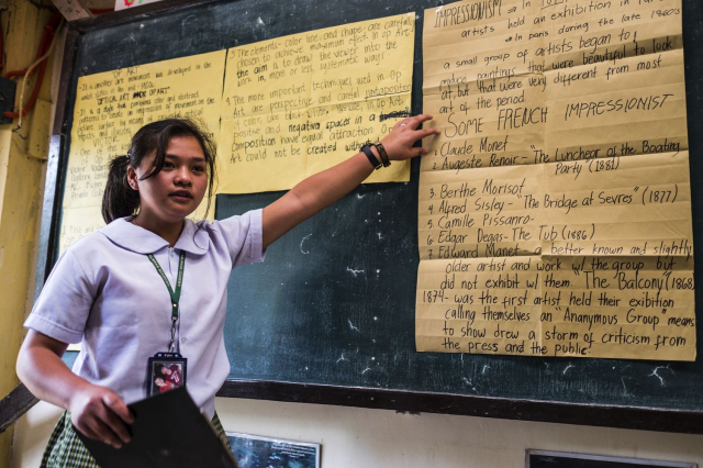 Free: Student presenting homework on blackboard, | Free Photo ...