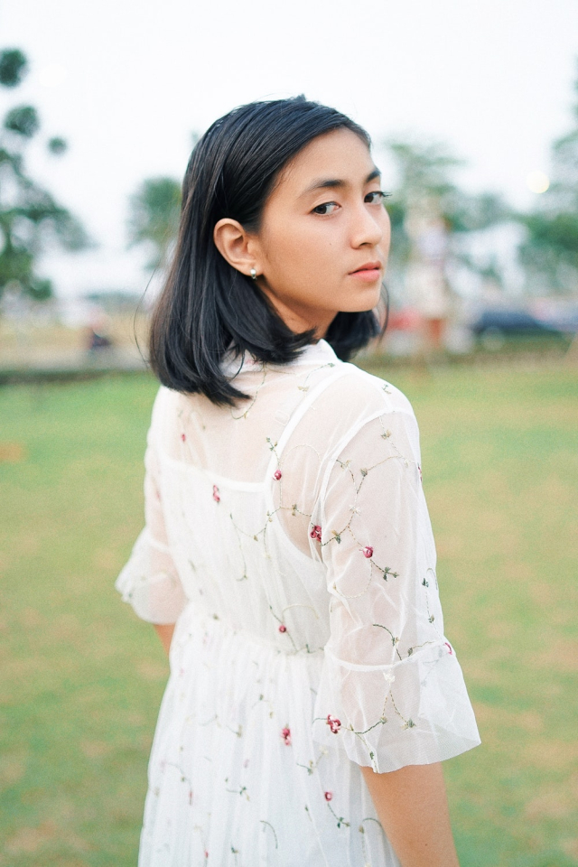 Free: Woman Standing Looking Back - nohat.cc