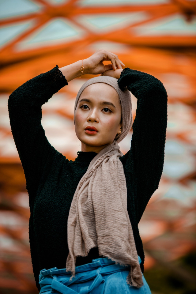 Free: Woman Wearing Headdress and Black Sweater Dancing - nohat.cc